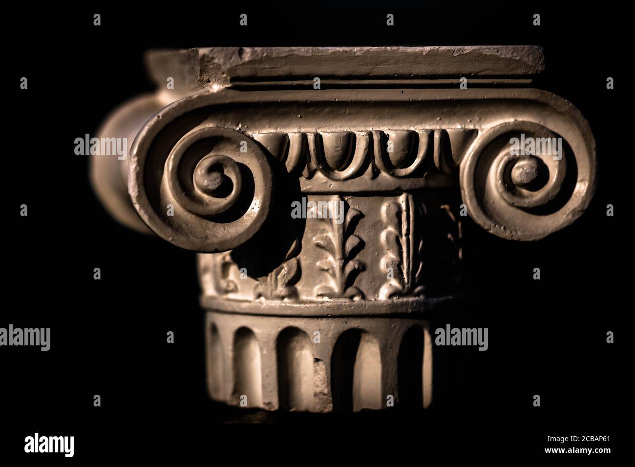 Dummy of an ancient Greek column isolated in black background Stock ...