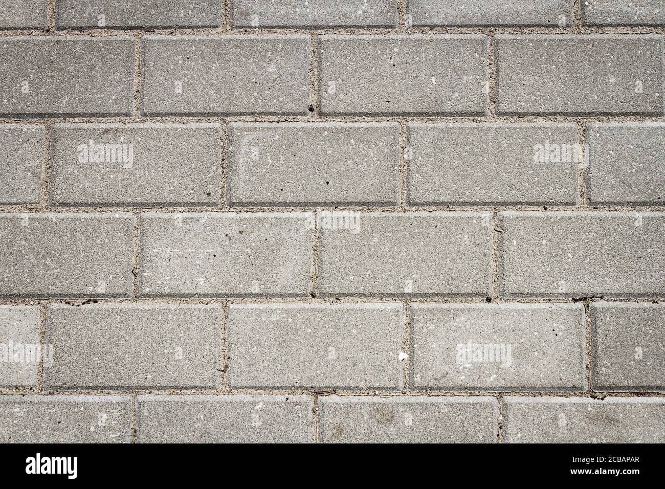 Old concrete tiles in the walkway. Abstract architecture background ...