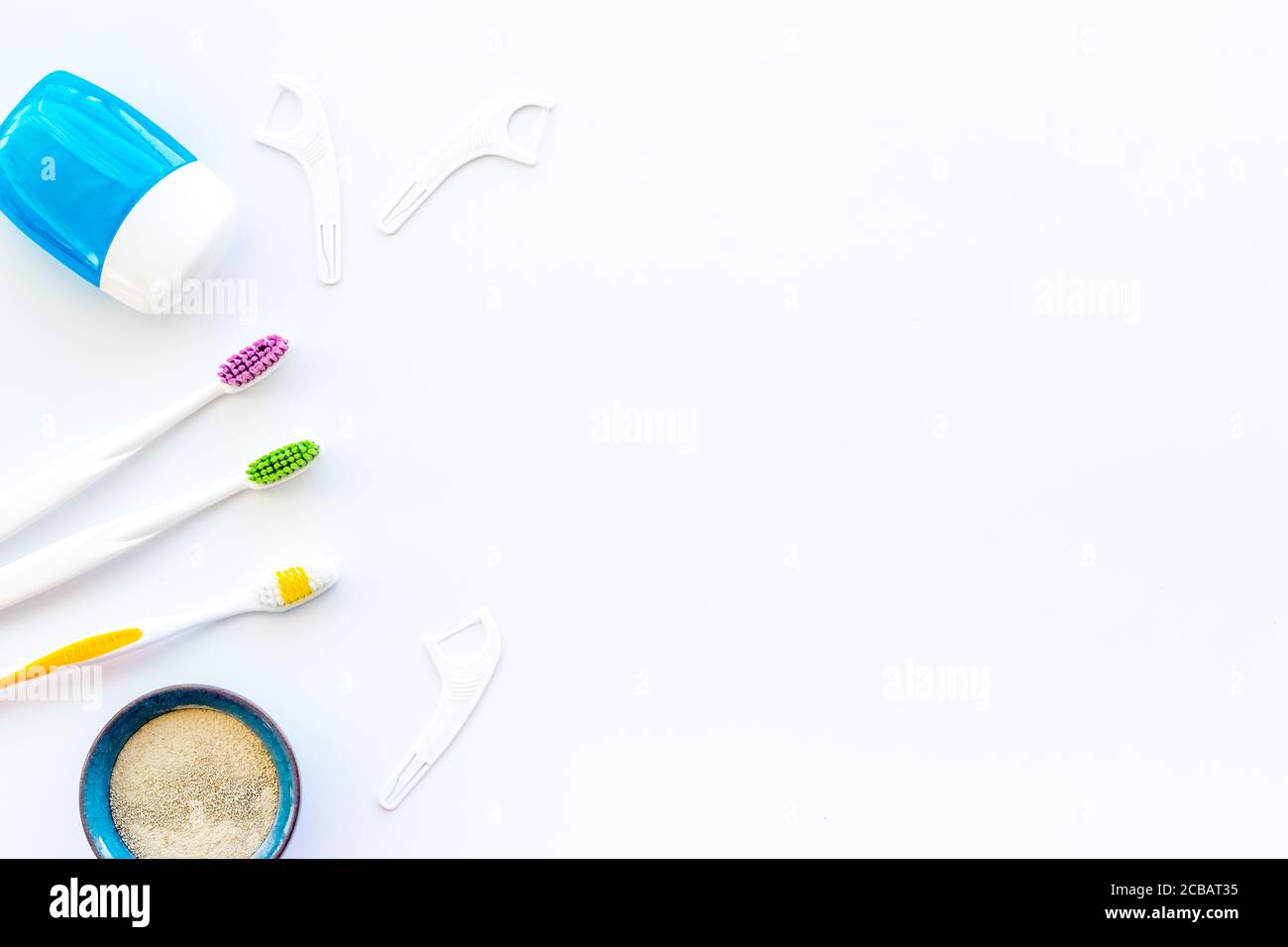 Concept of oral cleaning with toothbrushes, dental floss, tooth powder ...