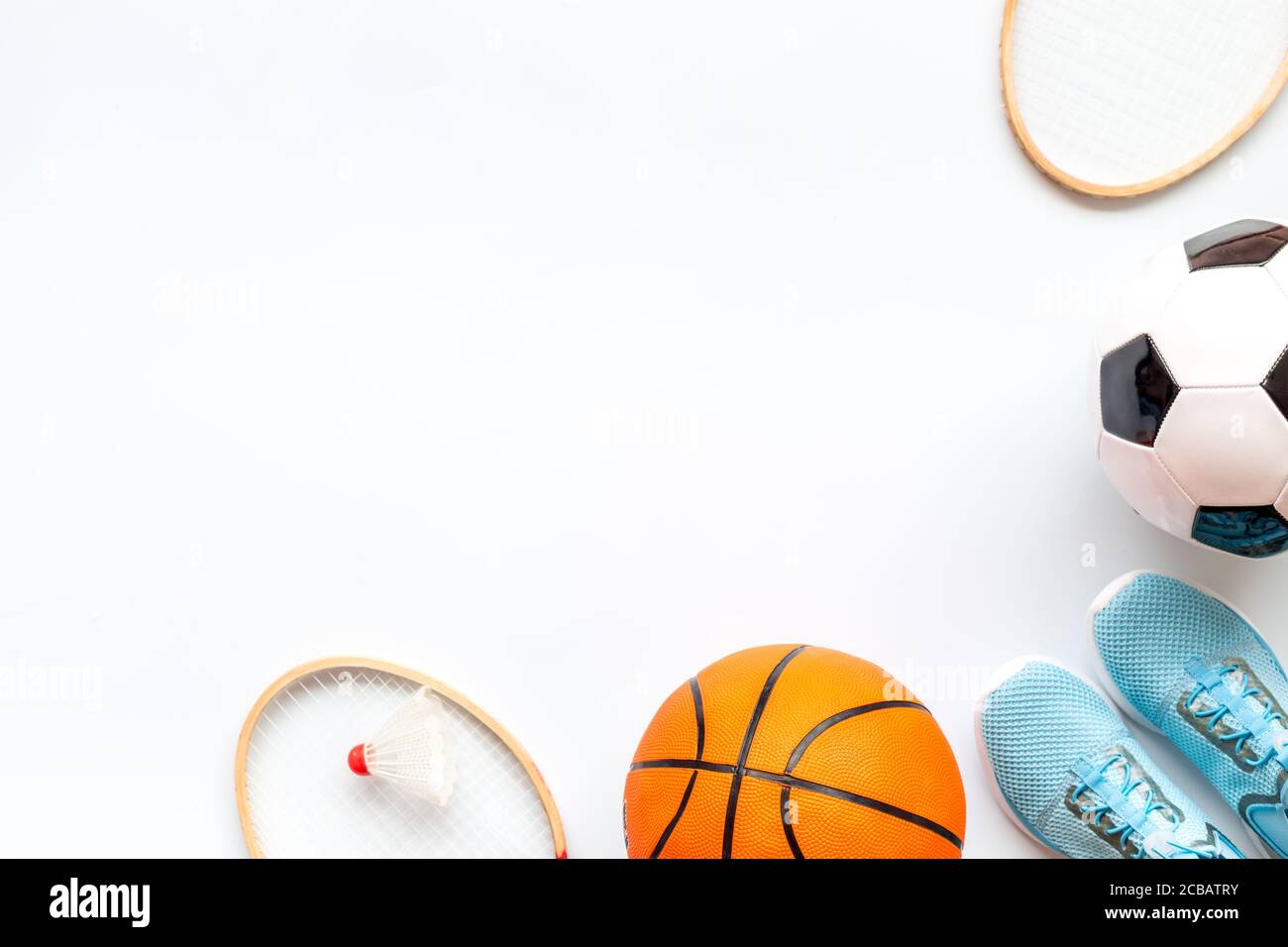 Frame of sport balls - football, basketball, badminton on white ...