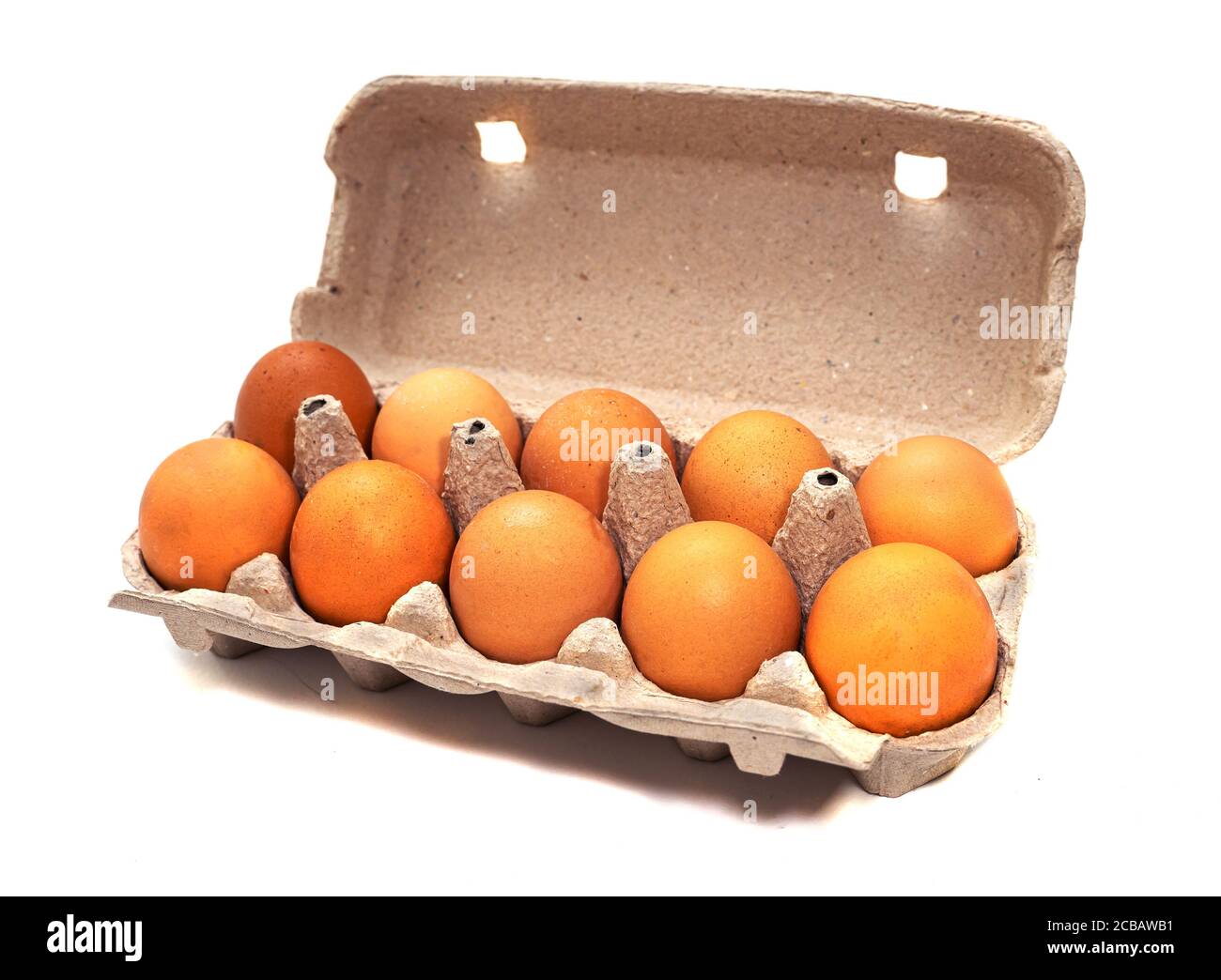 Ten eggs in a cassette on a white background isolated Stock Photo - Alamy