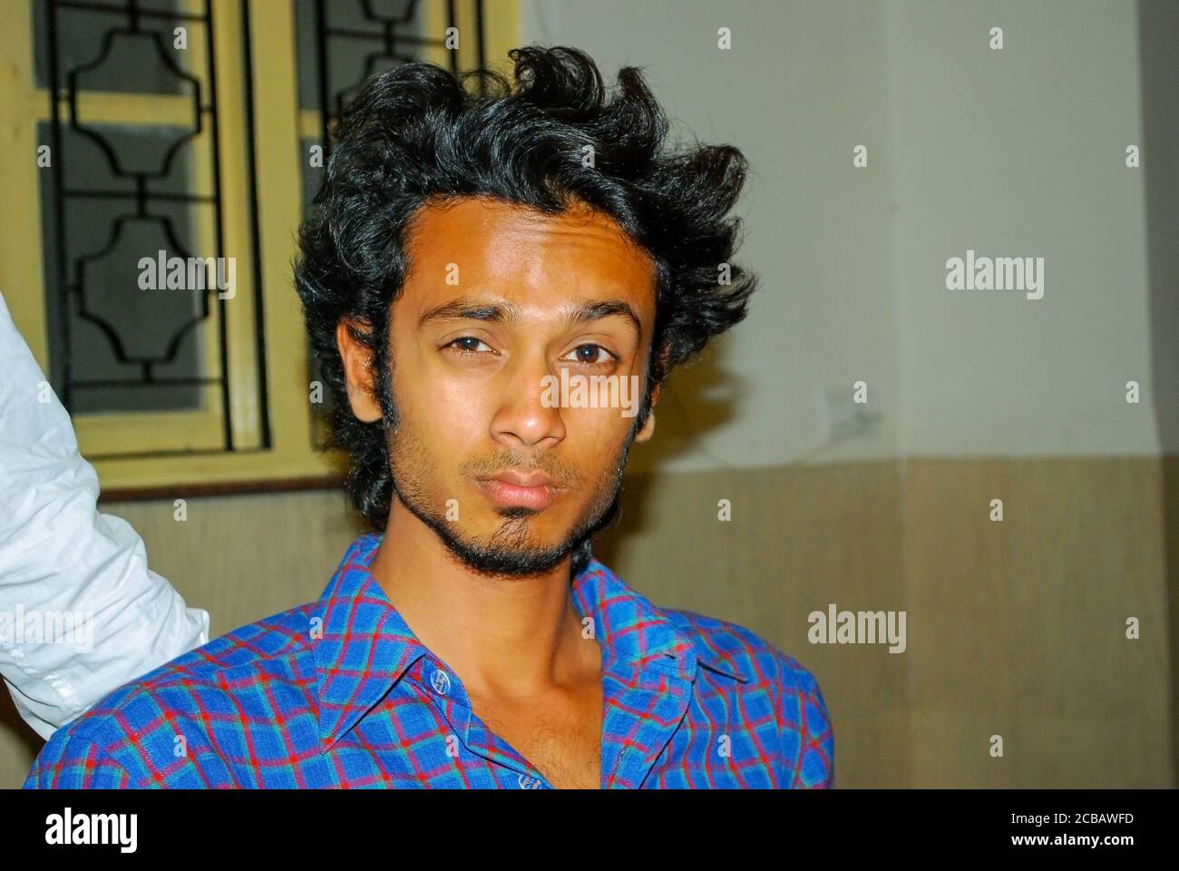 Shocked Funny Hair of Indian Dark Man Stock Photo - Alamy