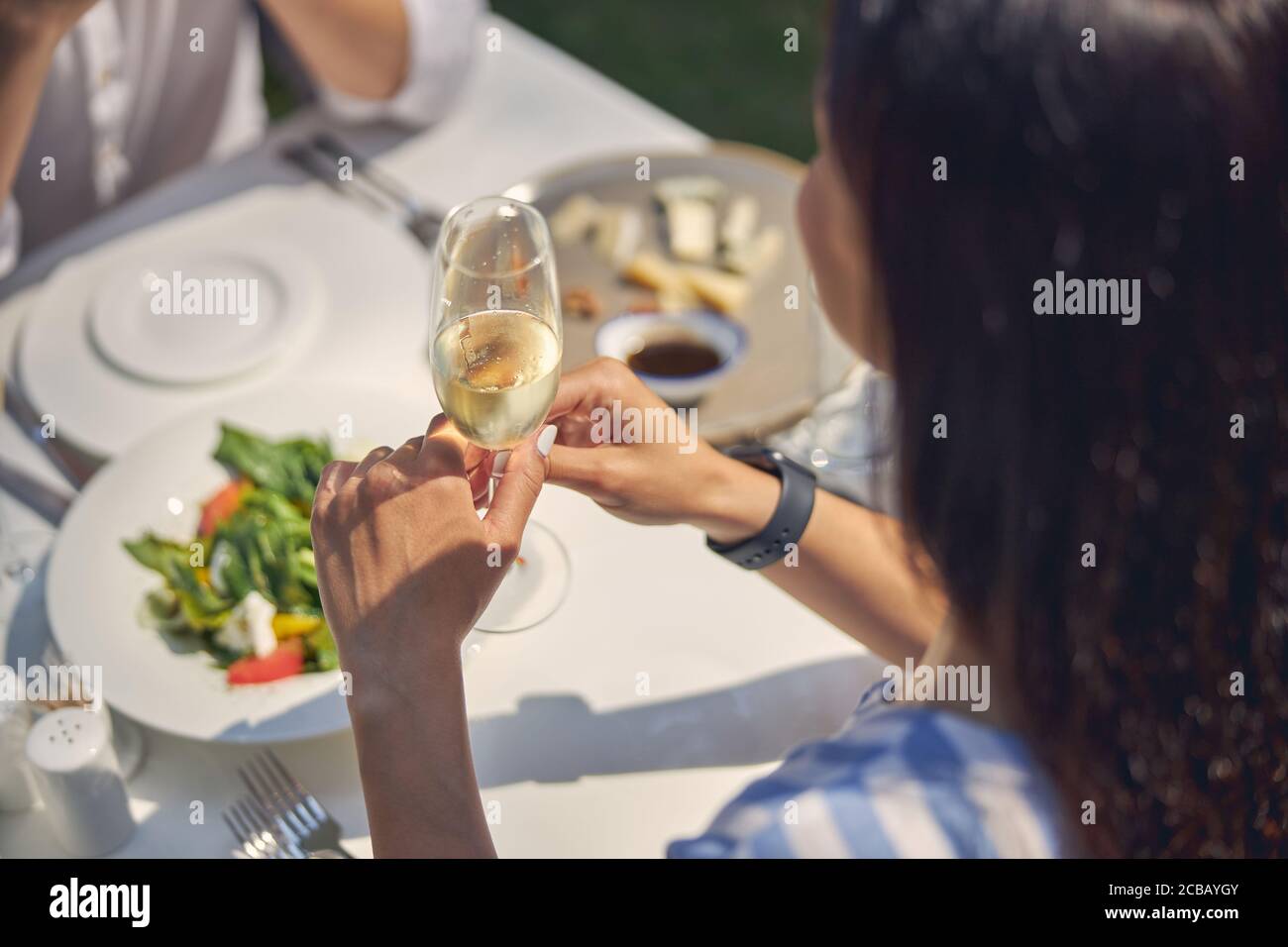 Female resting with gentleman at the lunch time Stock Photo - Alamy