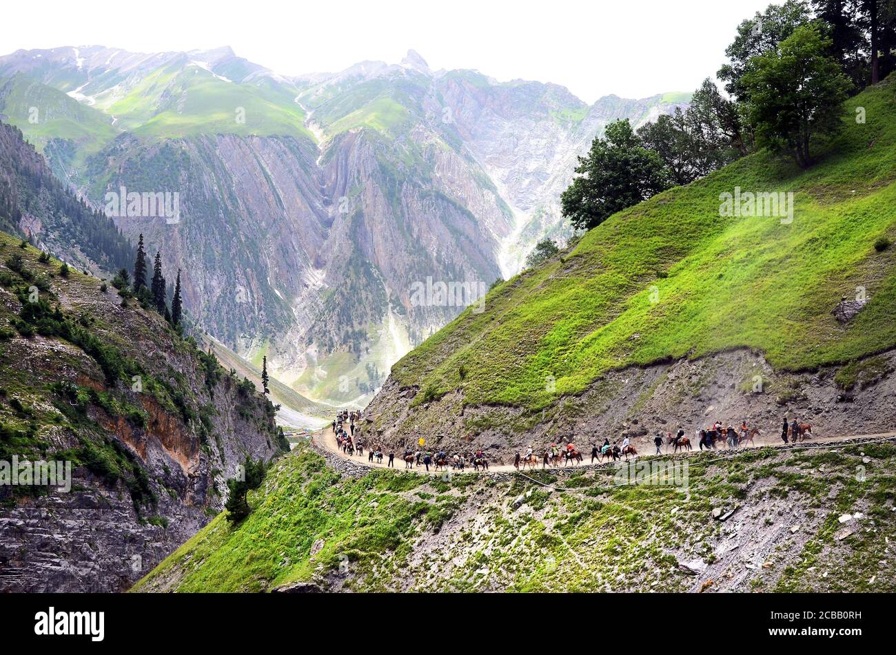 Hindu devotees visit during their pilgrimage from Baltal Base Camp to ...
