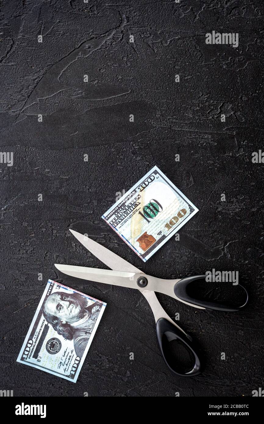 Decline of dollar exchange rate. Scissors cut dollars banknote Stock ...