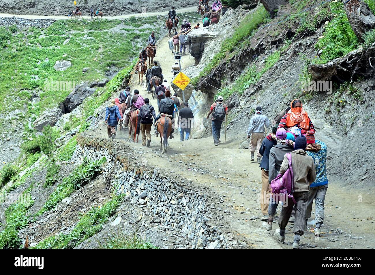 Hindu devotees visit during their pilgrimage from Baltal Base Camp to ...