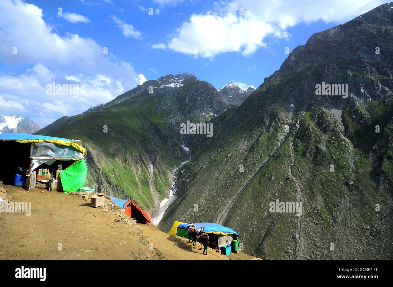Hindu devotees visit during their pilgrimage from Baltal Base Camp to ...