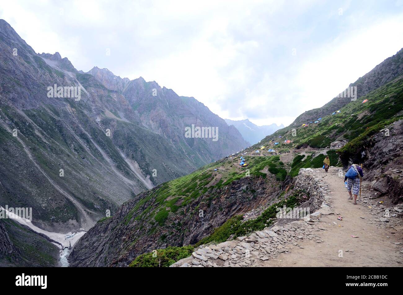 Hindu devotees visit during their pilgrimage from Baltal Base Camp to ...