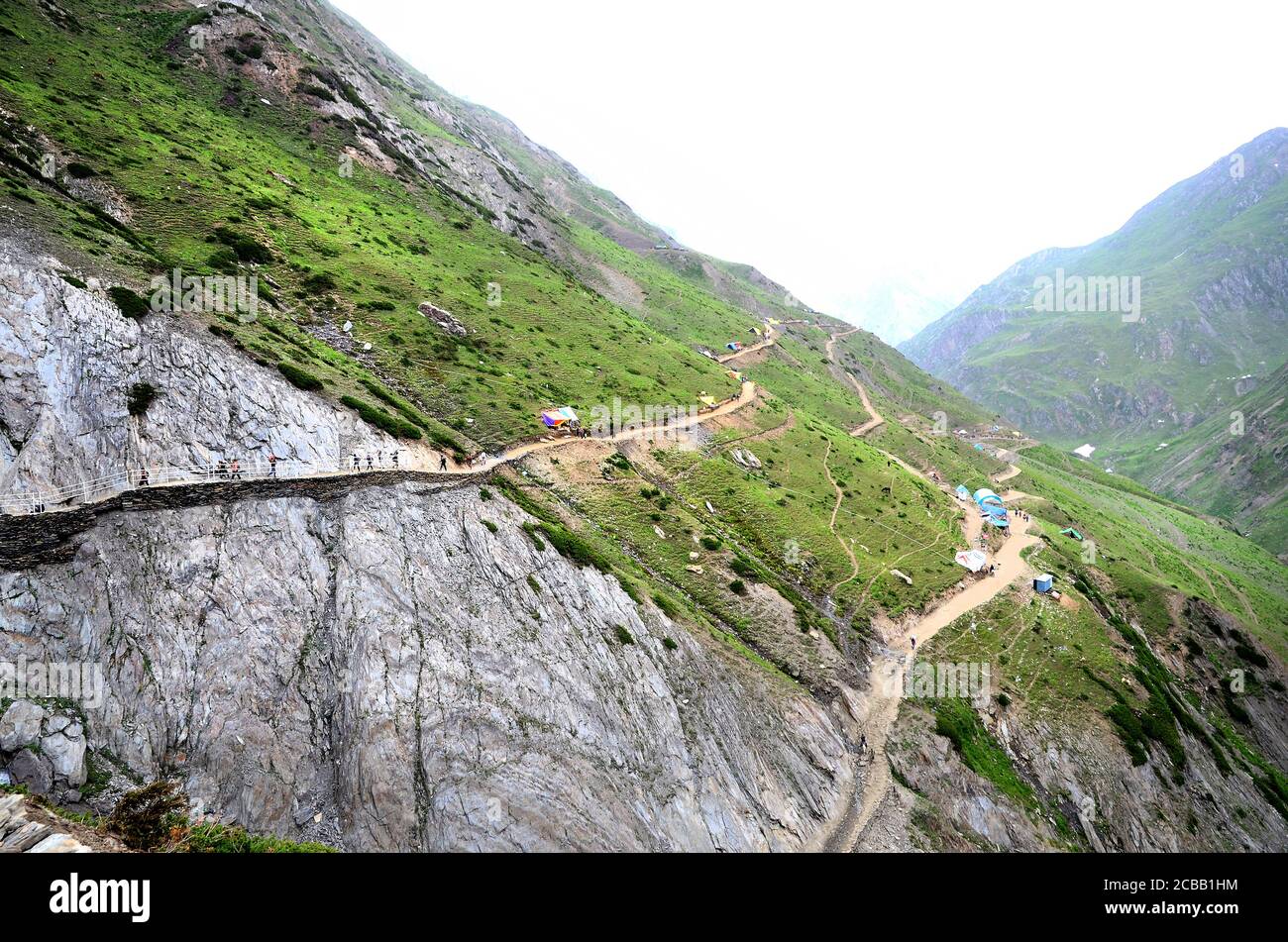 Hindu devotees visit during their pilgrimage from Baltal Base Camp to ...