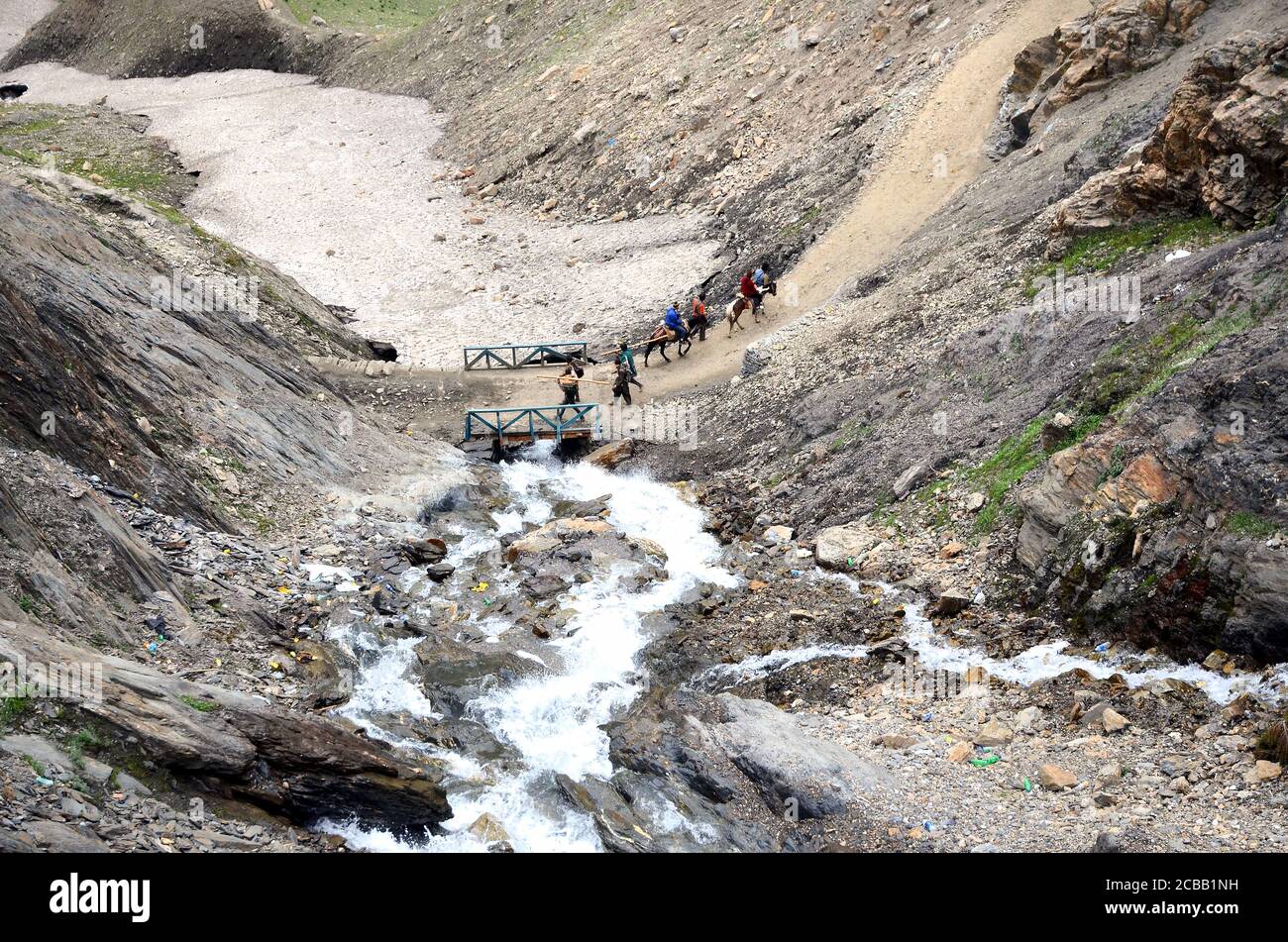 Hindu devotees visit during their pilgrimage from Baltal Base Camp to ...