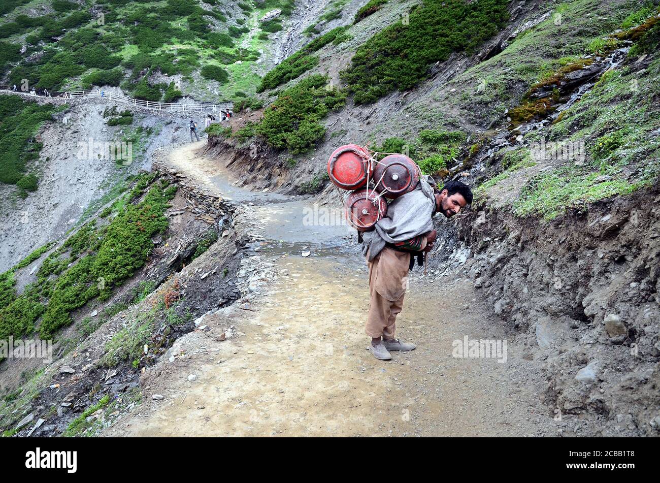 Hindu devotees visit during their pilgrimage from Baltal Base Camp to ...