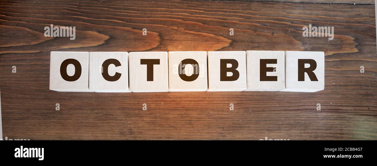 October word on wooden cubes.The October calendar agenda concept Stock ...