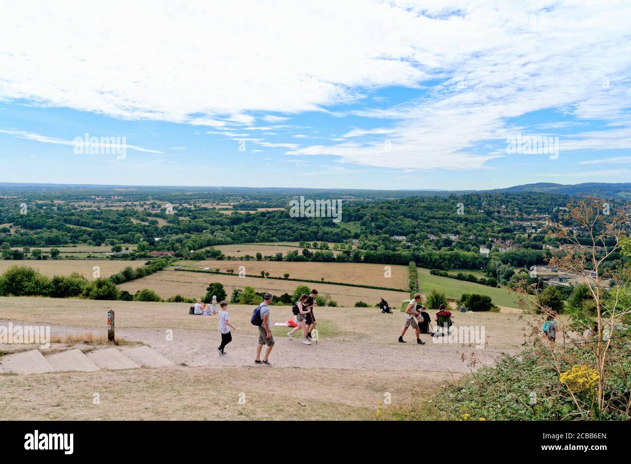 The view from the summit of a busy Box Hill looking across to the Weald ...