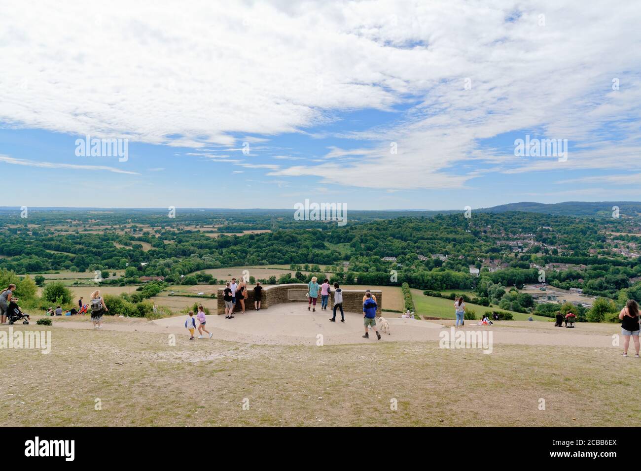 The view from the summit of a busy Box Hill looking across to the Weald ...