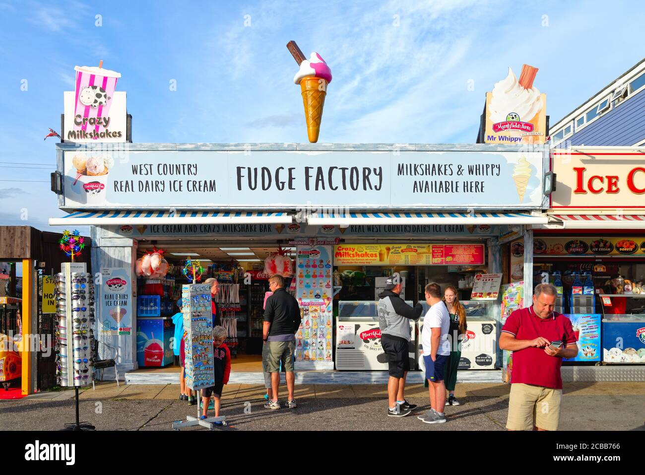 A colourful ice cream, fudge and refreshment stall on the seafront at ...