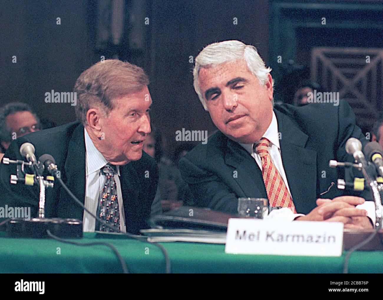 Viacom Chairman Sumner Redstone, left, discusses a question with CBS ...