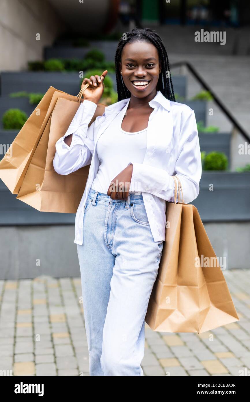 happy attractive african shopper in shopping mall Stock Photo - Alamy