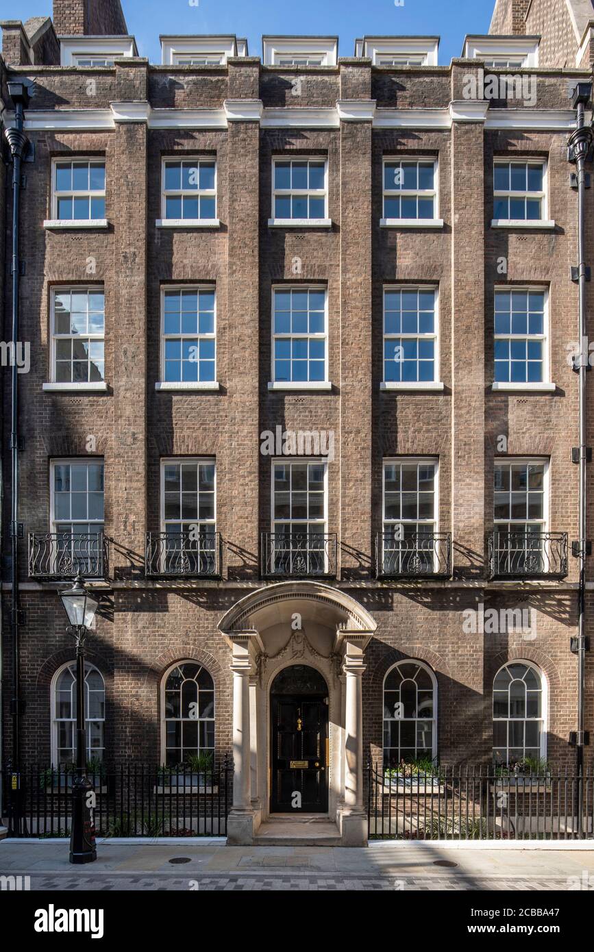 Axial view of south elevation of 1 Frederick's Place with masonry ...
