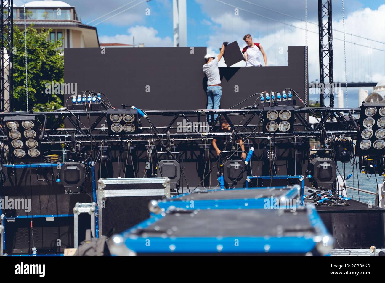 lighting and Led panel technician iinstalling professional lighting ...