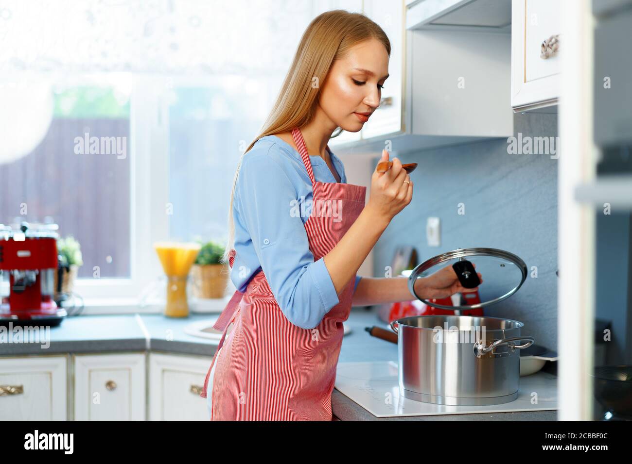 Checking if cooked hi-res stock photography and images - Alamy