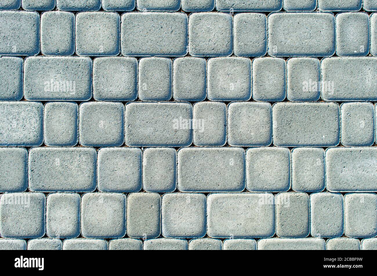 Gray paving slabs background texture. Exterior finishing. Construction ...