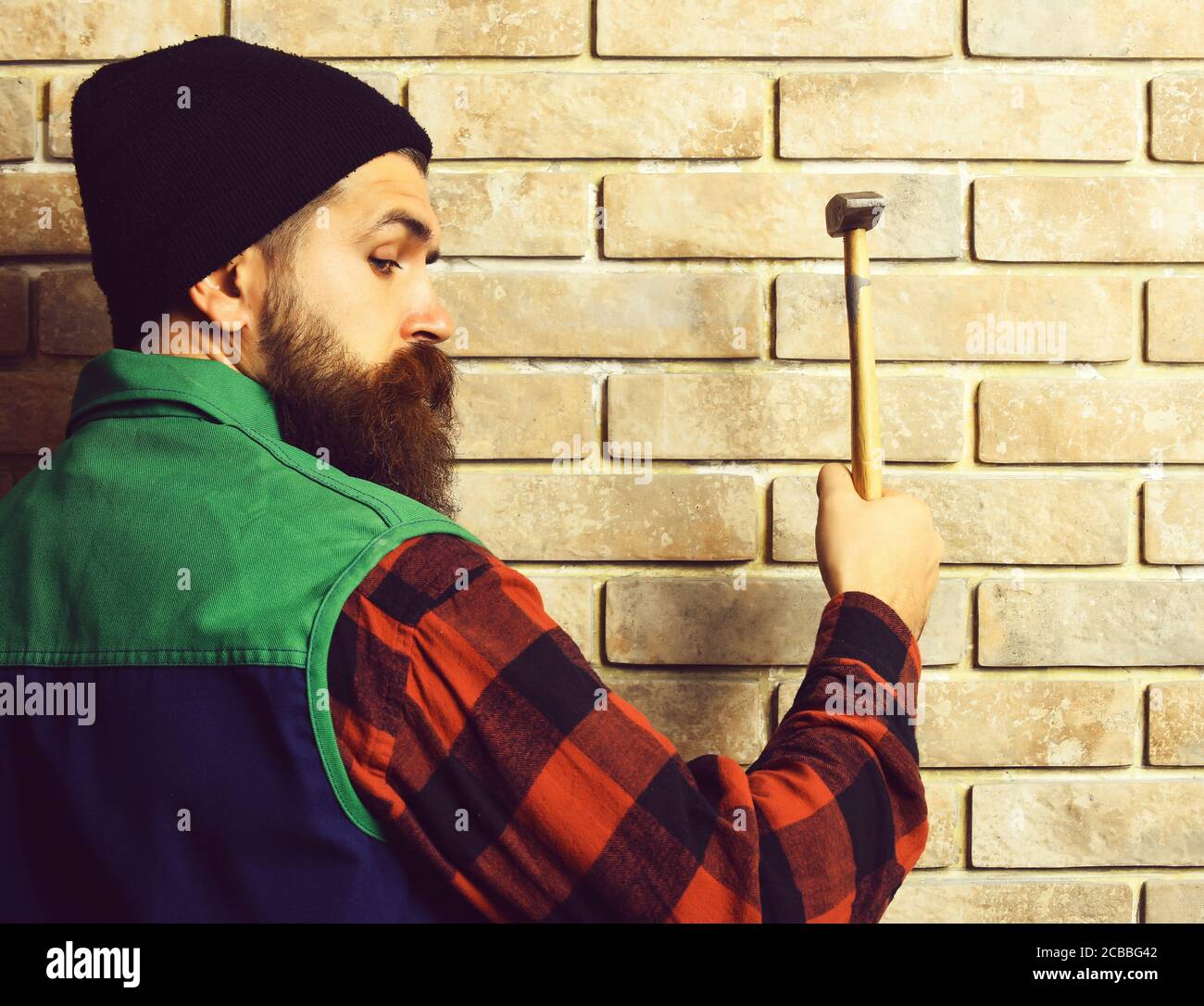 bearded builder man, long beard, brutal caucasian hipster with ...