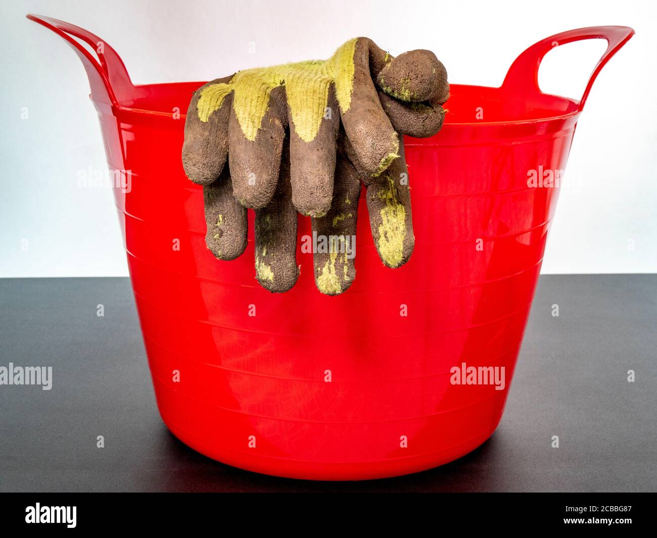 Old rubber gloves hi-res stock photography and images - Alamy