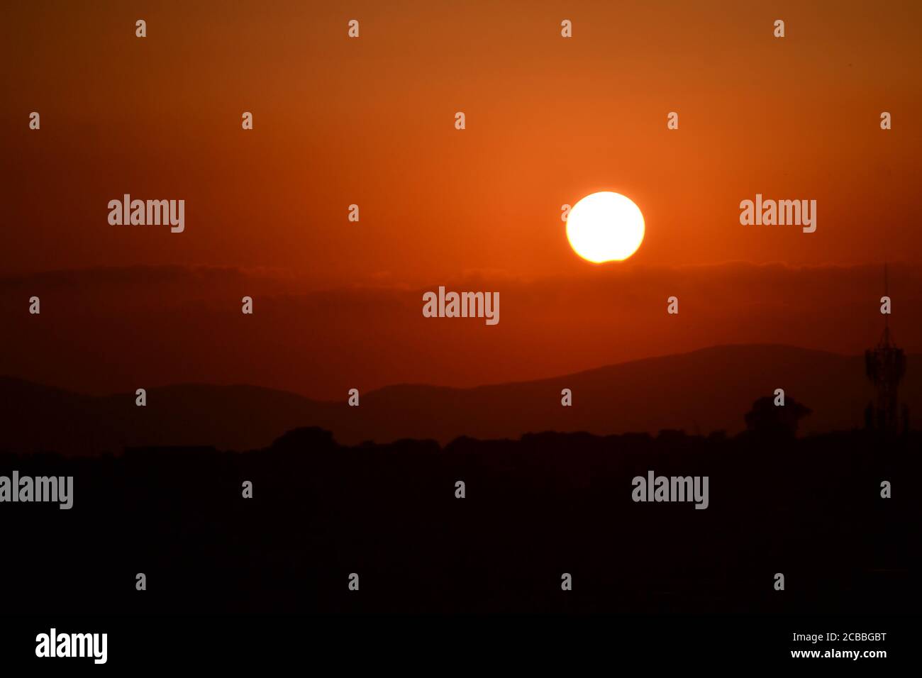 Solar eclipse in the city of Madrid, Spain, Europe Stock Photo - Alamy
