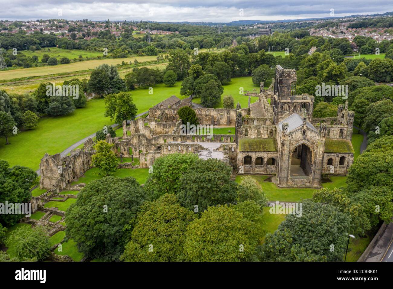 Kirkstall Abbey in Leeds, old ruined abbey surrounded by trees and ...
