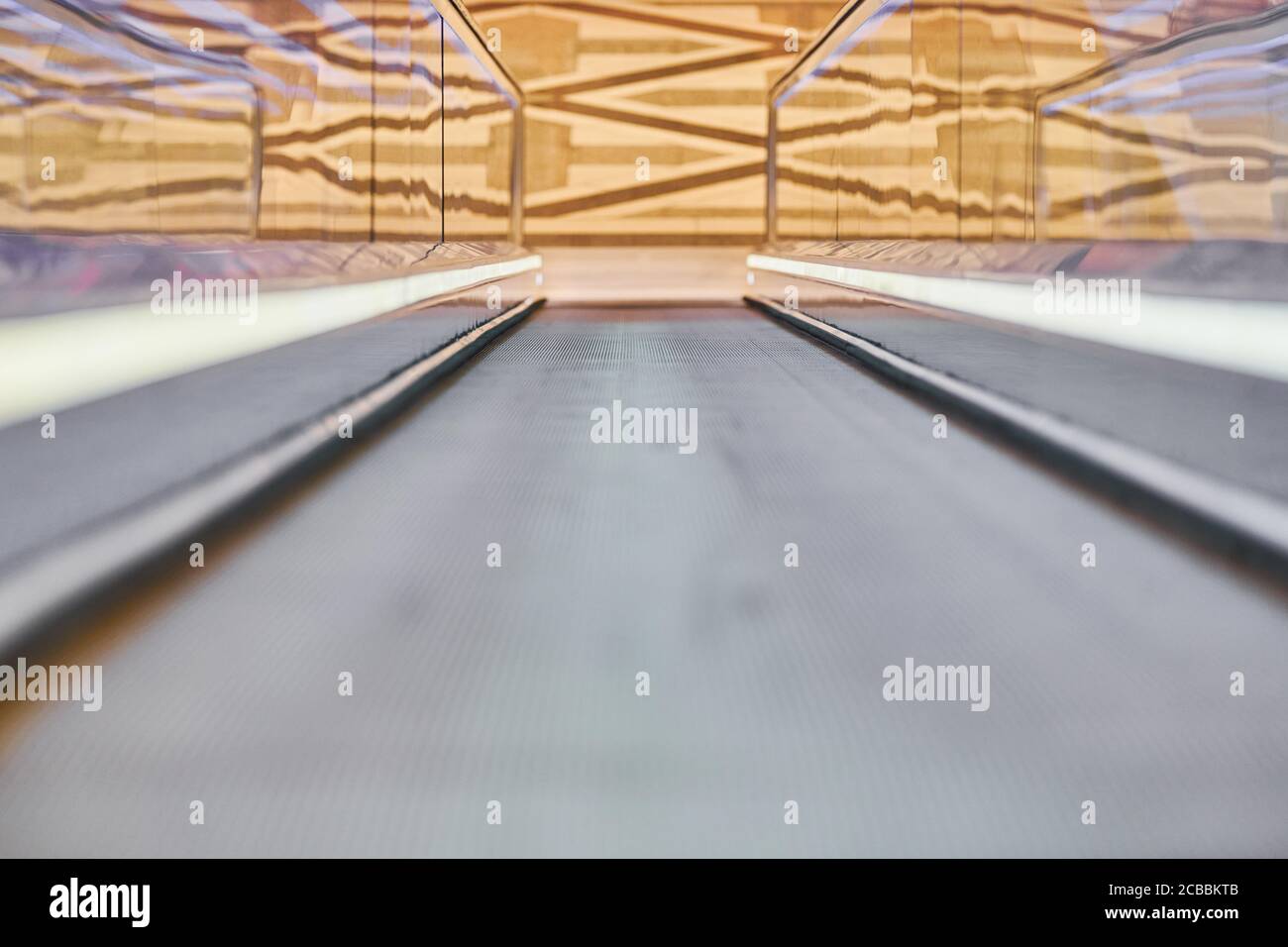 Moving walkway in shopping center. Horizontal slow-moving conveyor ...
