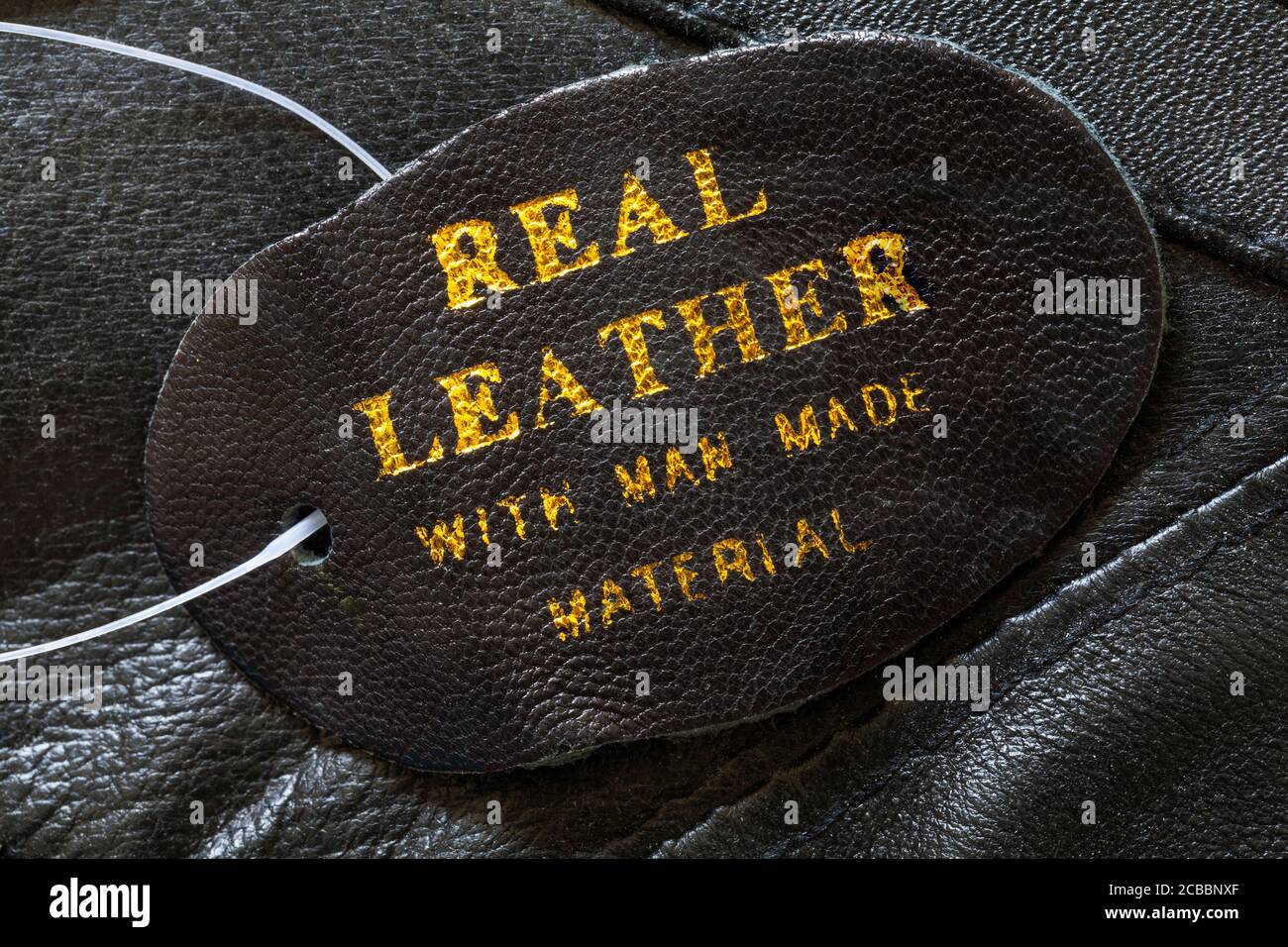 Real leather with man made material tag hi-res stock photography and ...