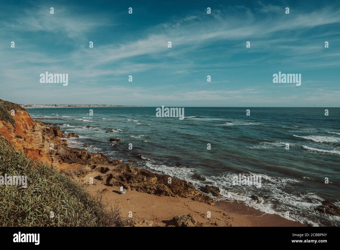 Amazing shot of a beautiful rocky beach under the sunlight Stock Photo ...
