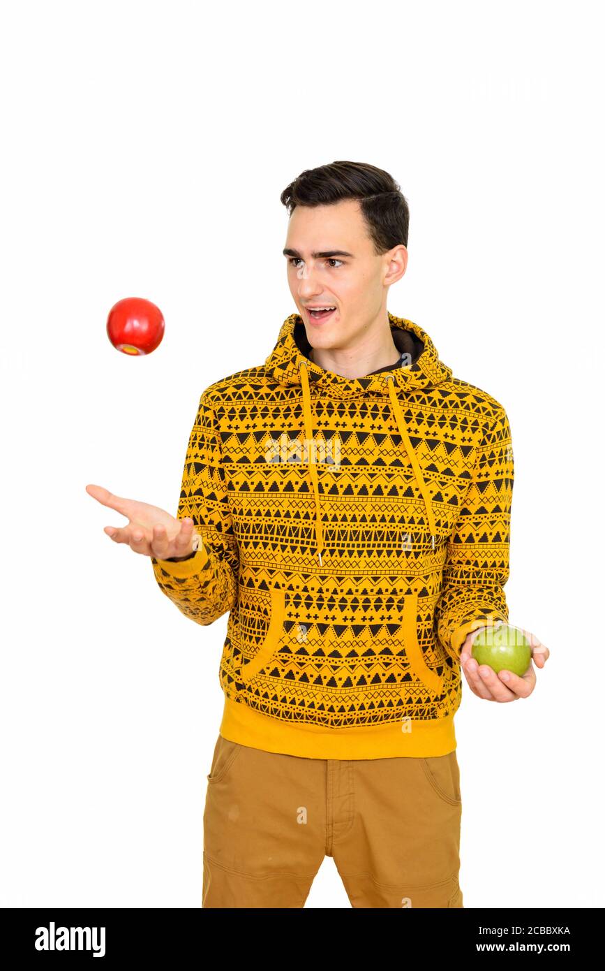 Portrait of young man with an apple hi-res stock photography and images ...
