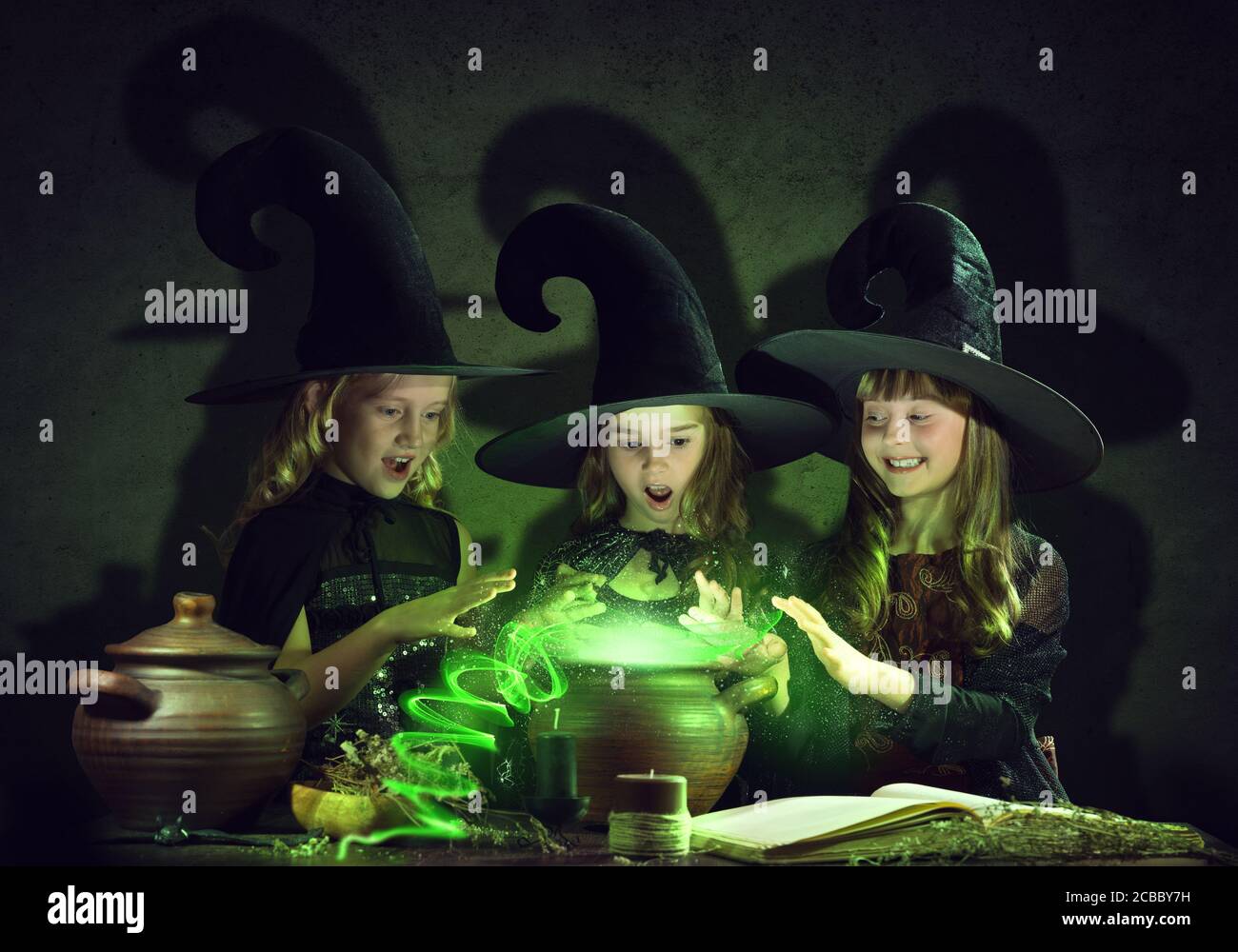 Three little witches Stock Photo - Alamy