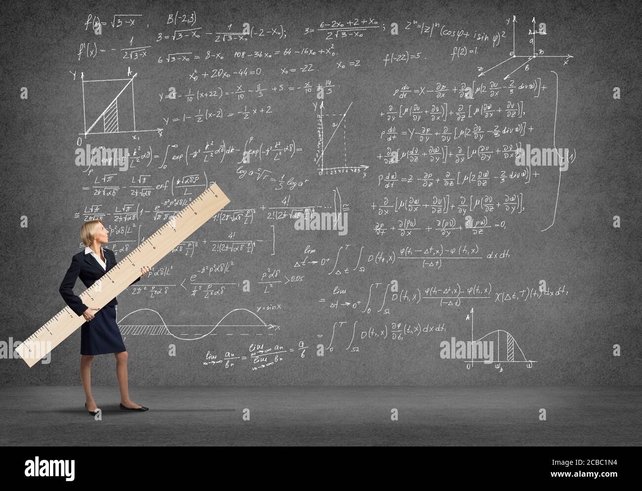 Woman with ruler Stock Photo - Alamy