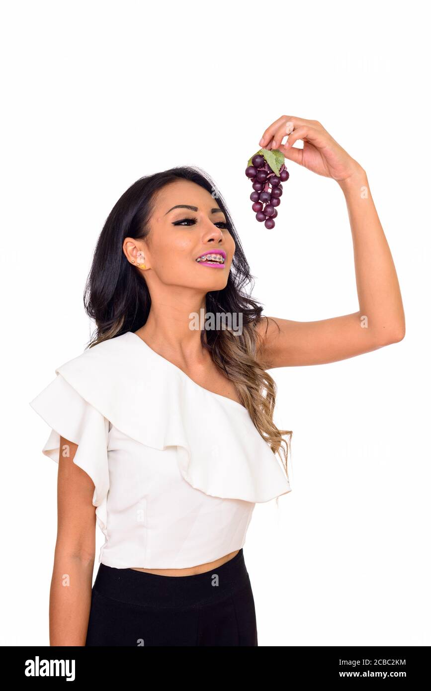 Woman eating grapes hi-res stock photography and images - Alamy
