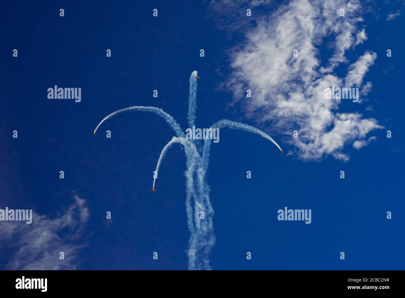 Inversion trail of the plane. A small plane practices aerobatics Stock ...