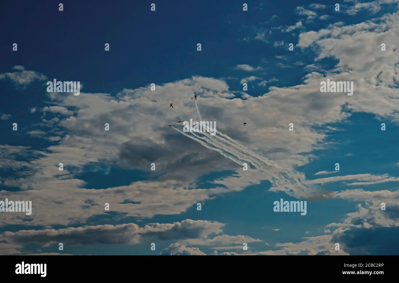 Inversion trail of the plane. A small plane practices aerobatics Stock ...