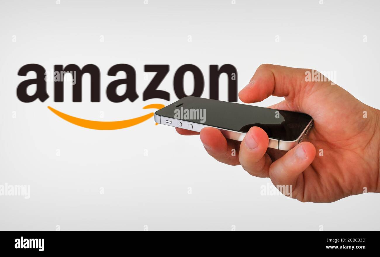 Amazon logo with mobile phone Stock Photo - Alamy
