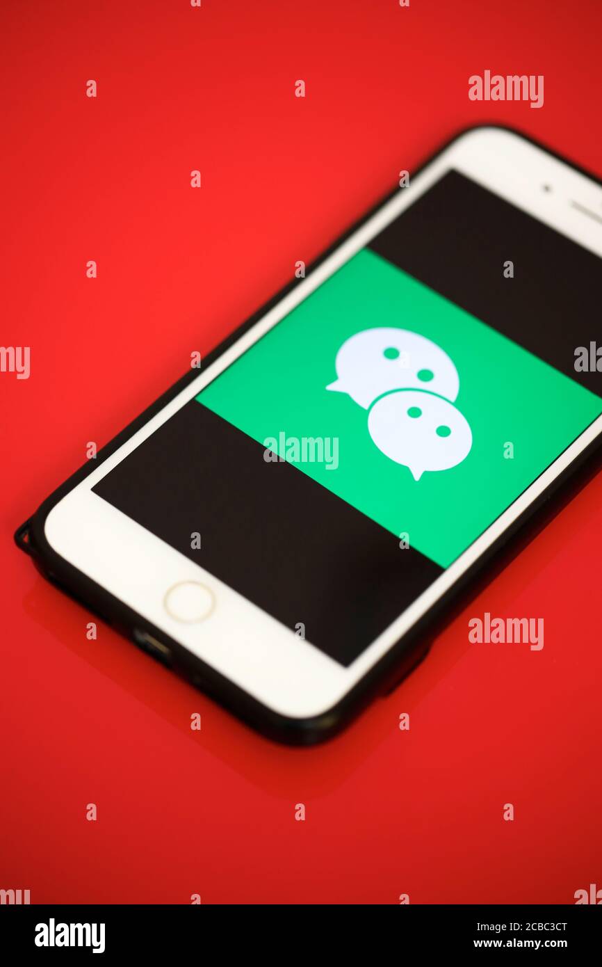 The logo of WeChat on an iPhone screen Stock Photo - Alamy