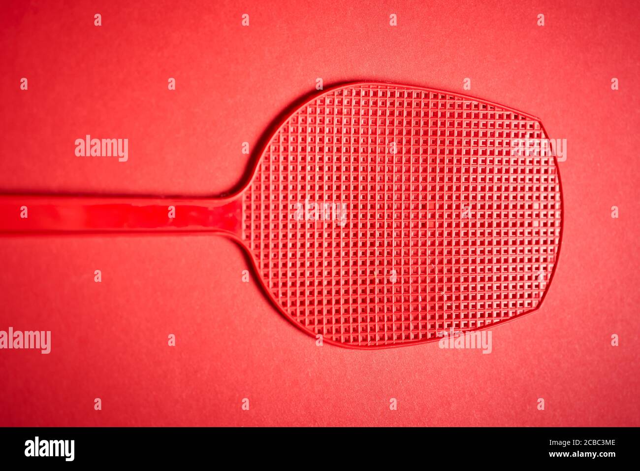 red isolated plastic fly trap on intense colored background Stock Photo ...