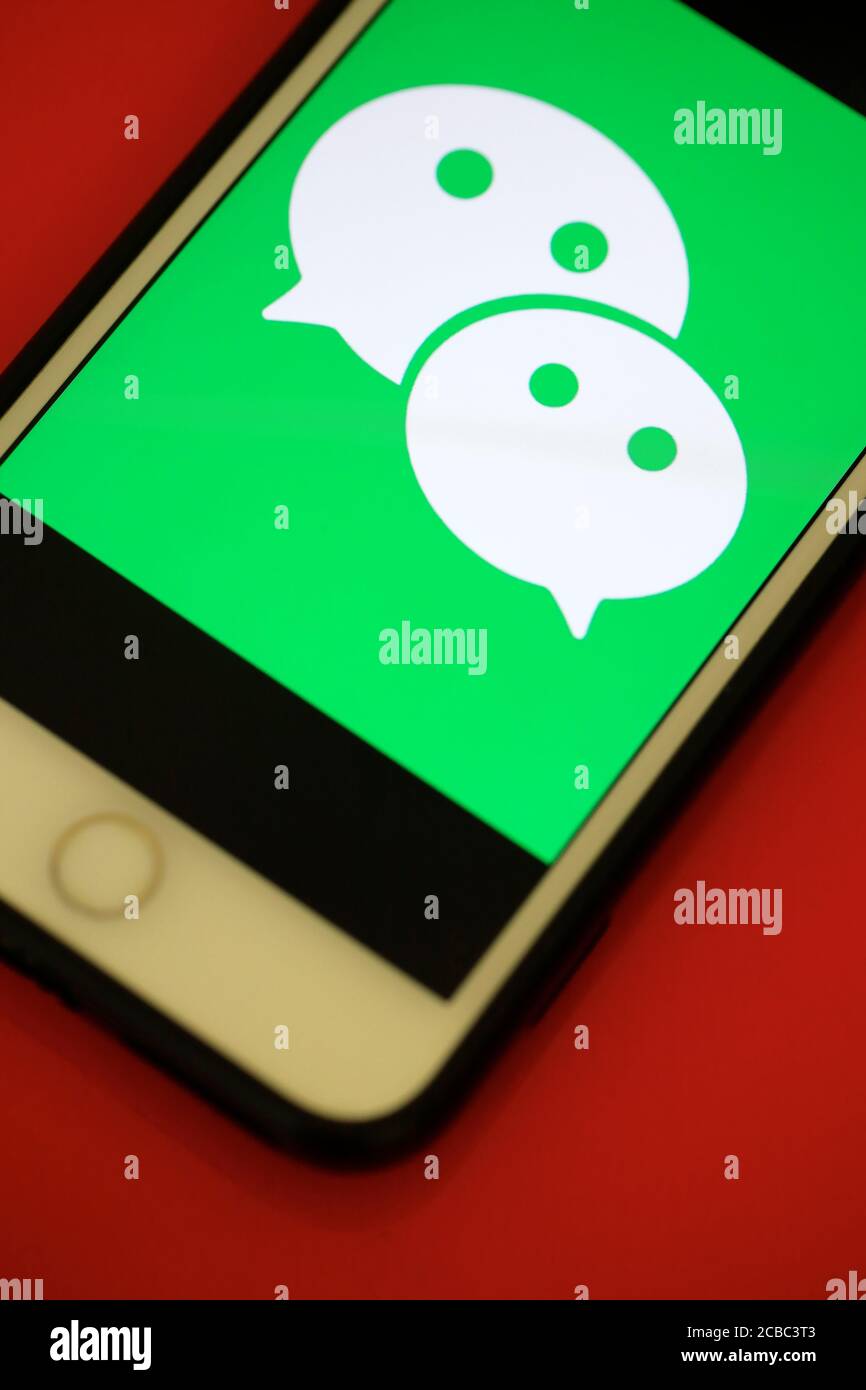 The logo of WeChat on an iPhone screen Stock Photo - Alamy