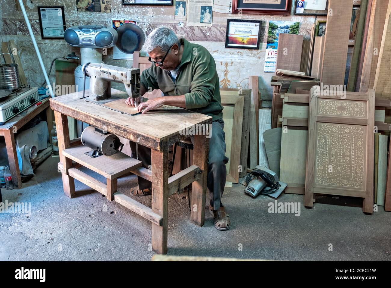 Mexican artist Francisco Aguirre creates inlaid wood designs using a ...