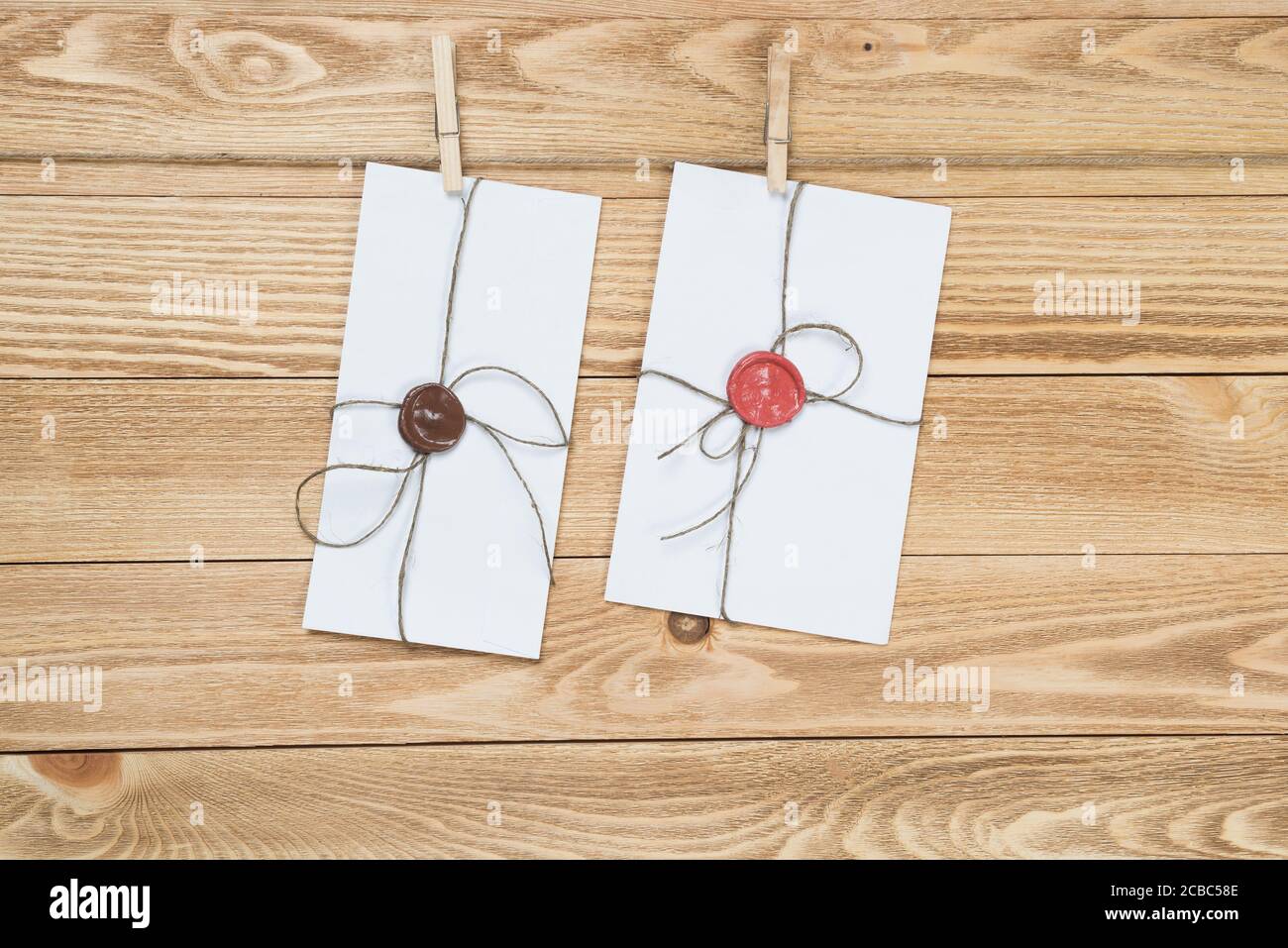 Mail envelope on rope Stock Photo - Alamy