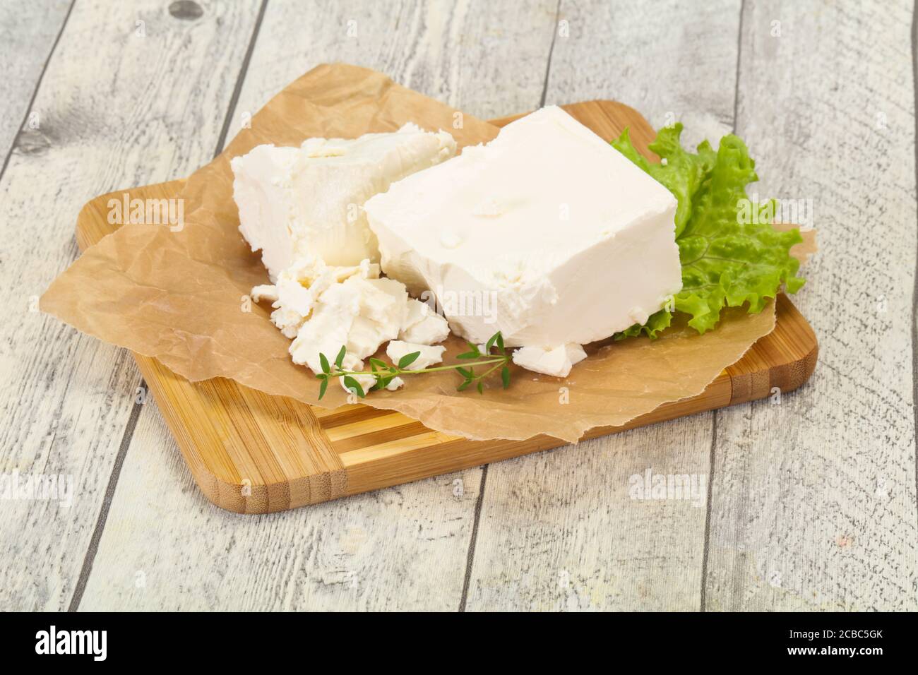 Greek traditional Feta soft cheese in the plate Stock Photo - Alamy