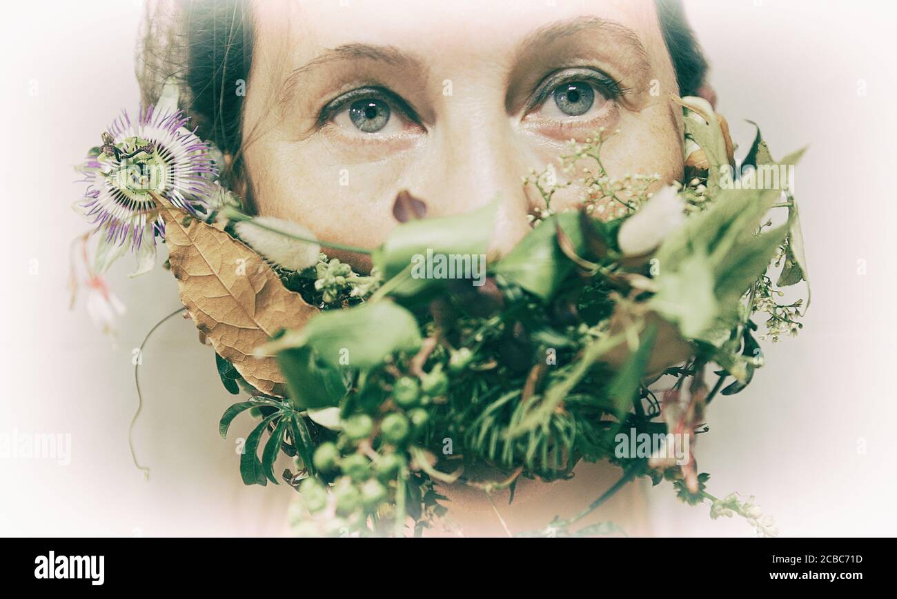 One woman face mask flowers hi-res stock photography and images - Alamy
