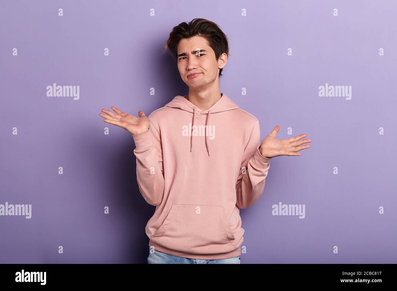 clueless puzzled man doesn't know what to do, close up portrait ...