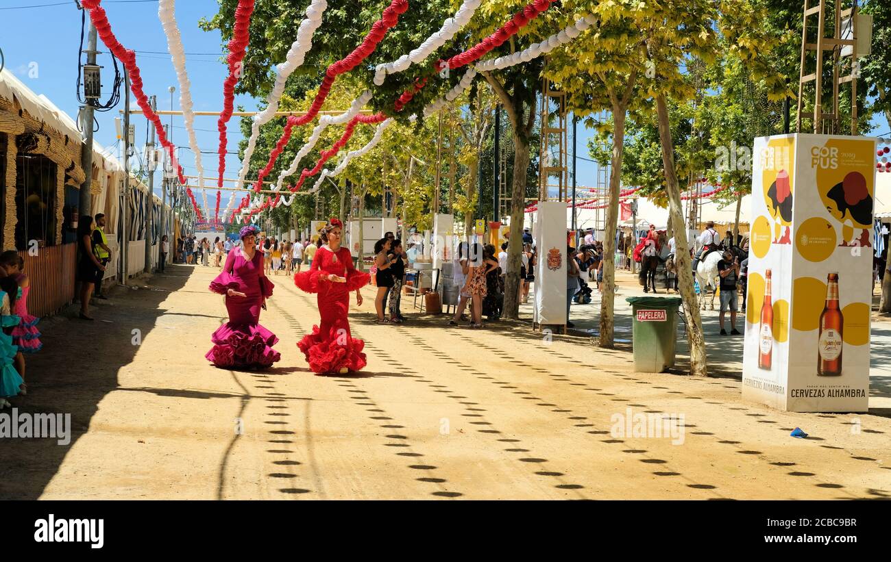 Two women wearing in traditional Spanish Flamenco dress during the 2019 ...