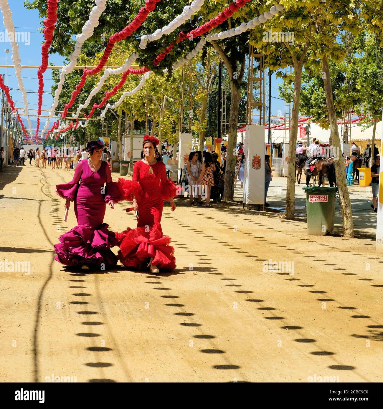 Two women wearing in traditional Spanish Flamenco dress during the 2019 ...
