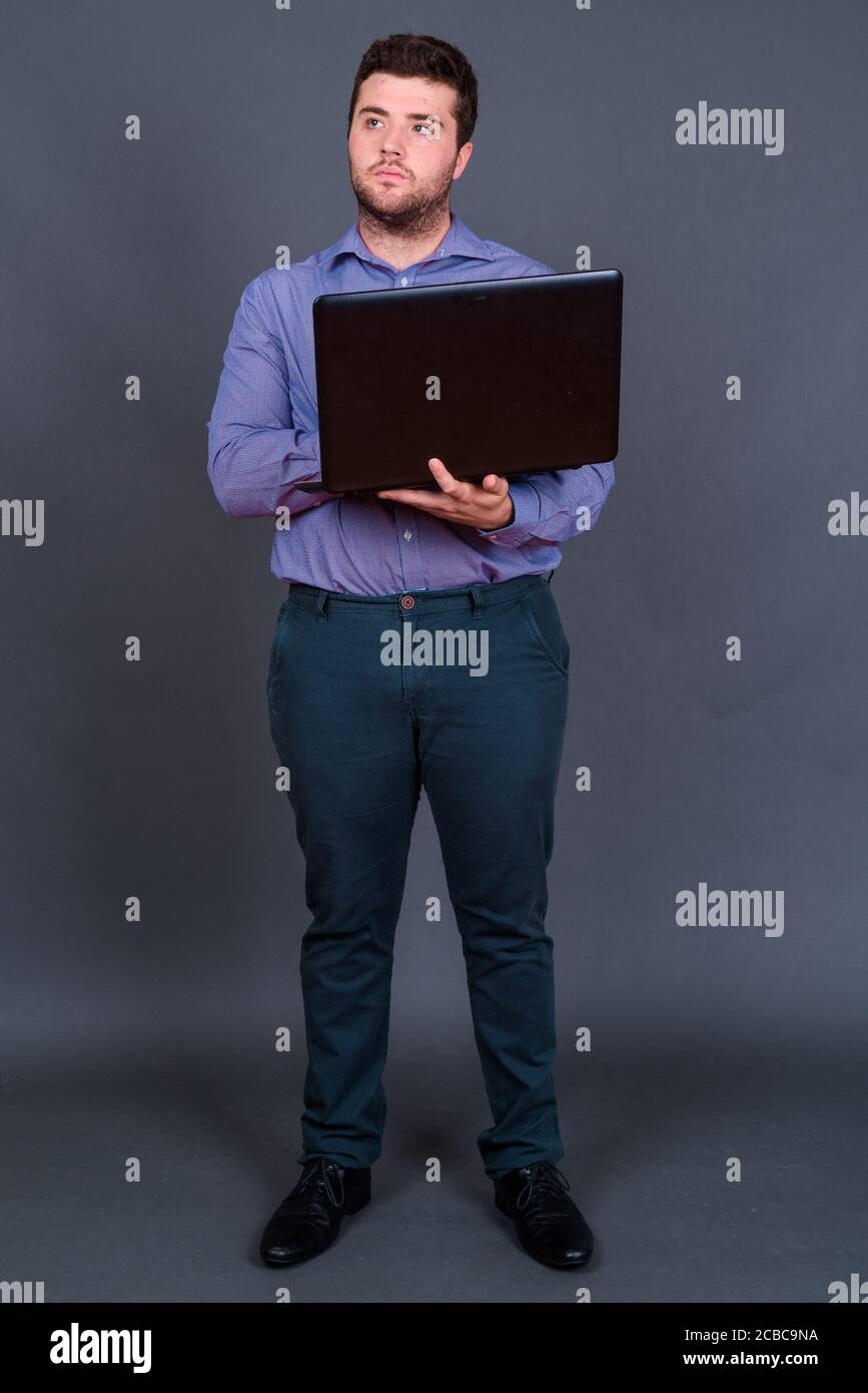 Fat guy at computer hi-res stock photography and images - Alamy